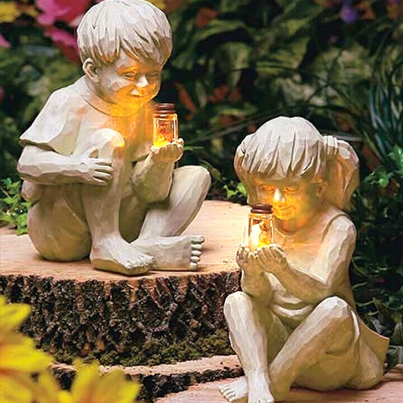A Kid With Solar Fireflies Garden Statue Resin Jar... – Grandado