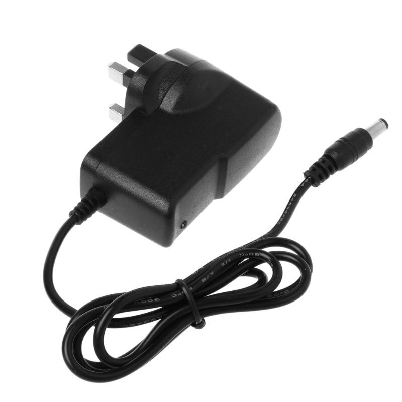 Switching Power Supply AC 100 240V To DC 9V 1A Converter Adapter UK