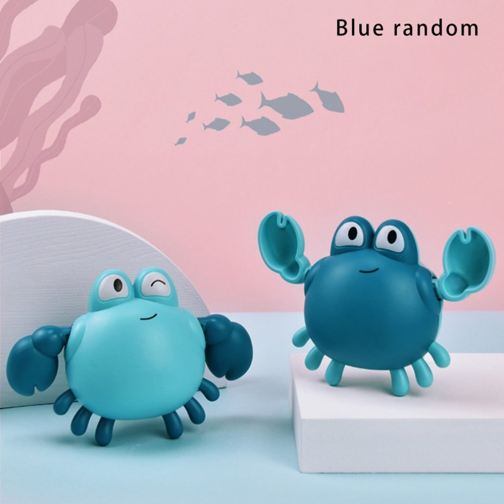Children playing in the water small crab toy clock... – Grandado