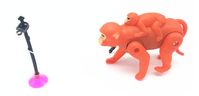 Electric monkey with a pile of 360-degree rotating... – Grandado