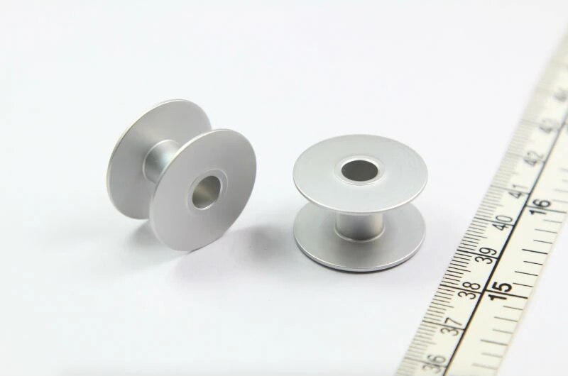 B1805-210-00 ALUMINIUM BOBBIN FOR JUKl AMS-210 BRO... – Vicedeal