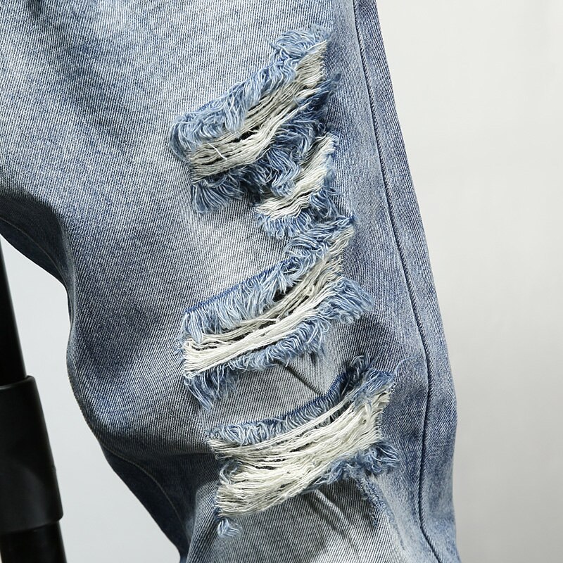 men's light-colored ripped jeans skinny feet rippe... – Grandado