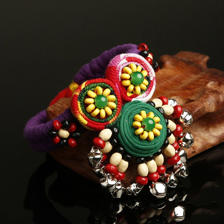 Hand-woven beaded embroidery features ladies brace... – Grandado