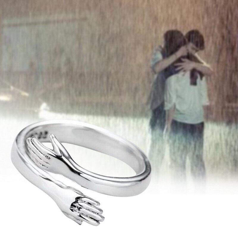 Romantische Hand Met Liefde Knuffel Ringen Creatie... – Vicedeal