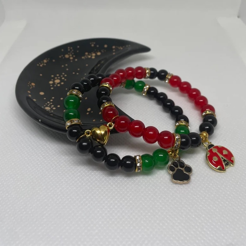 Handmade red and green bead bracelets with ladybug... – Grandado