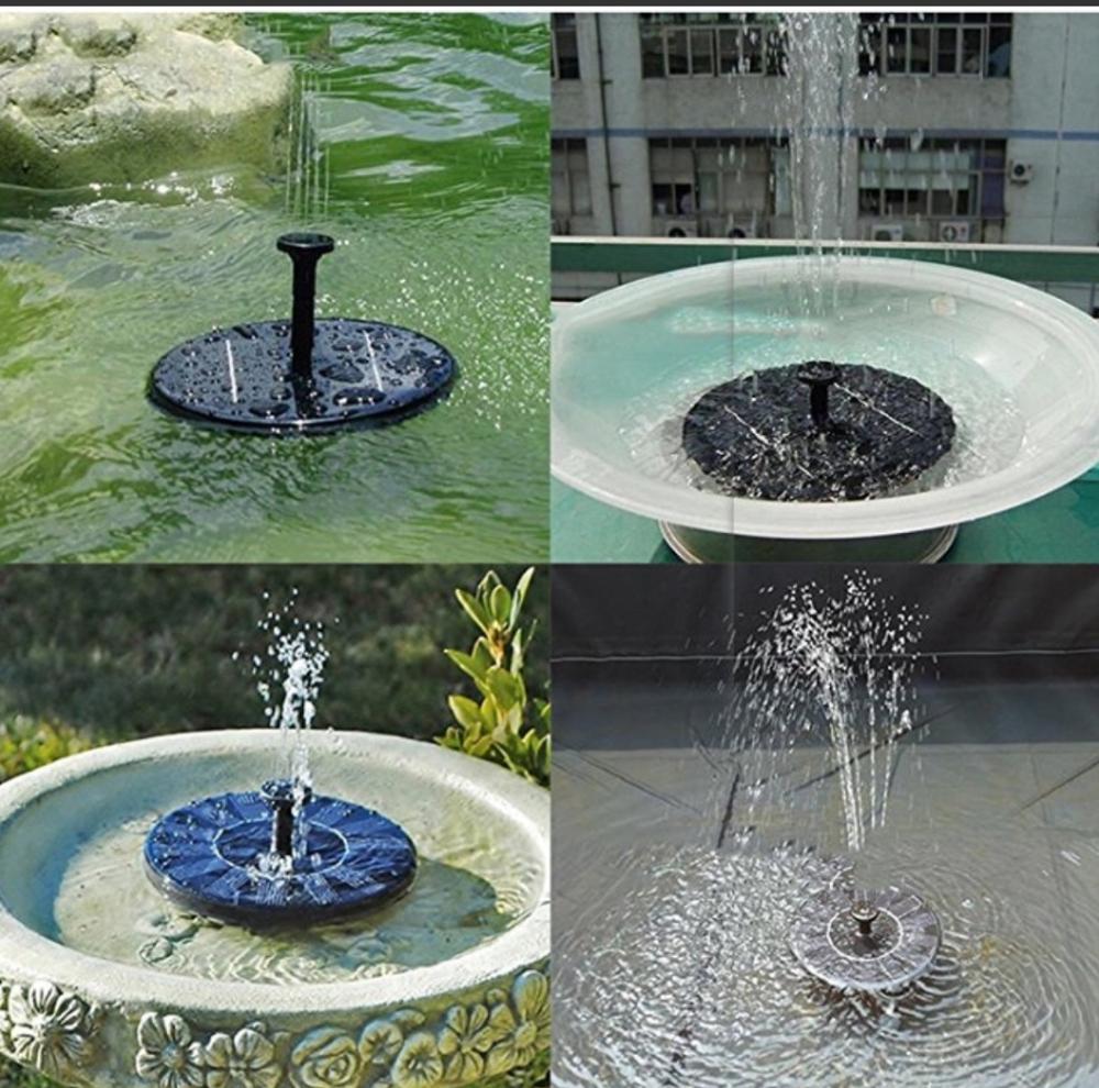 The mini solar water pump decorates the garden wit... – Grandado