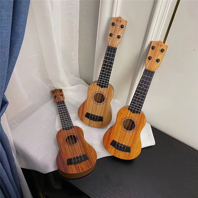 Mini 4 Strings Guitar Classical Ukulele Guitar Toy... – Grandado