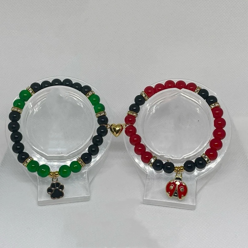 Handmade red and green bead bracelets with ladybug... – Grandado