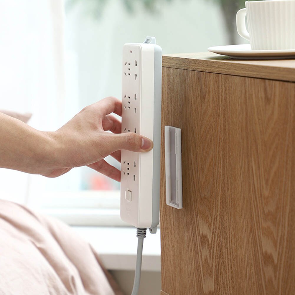 Powerful Traceless Wall-Mounted Sticker Plug Fixer... – Grandado