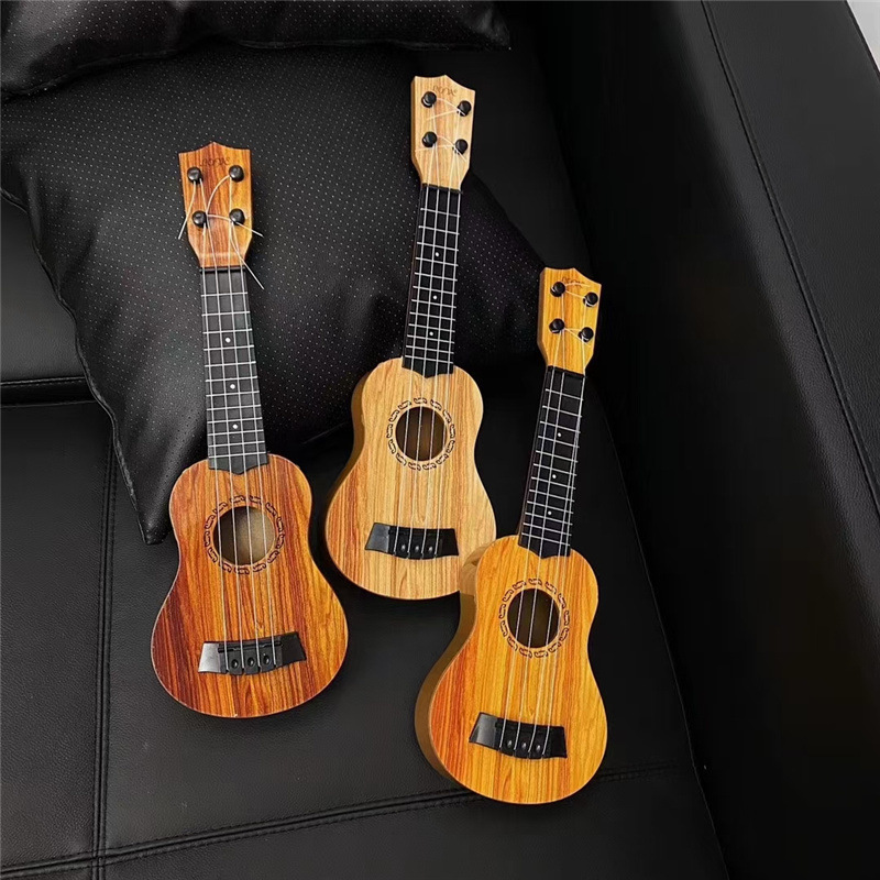 Mini 4 Strings Guitar Classical Ukulele Guitar Toy... – Grandado
