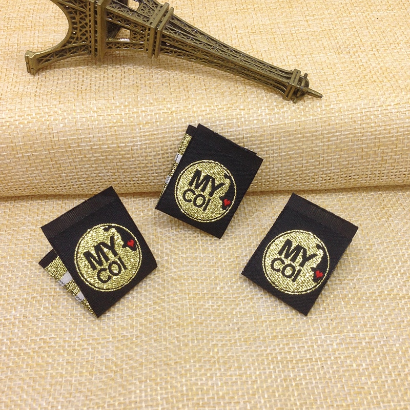 Apart gesneden gevouwen kledinglabels op maat gema... – Vicedeal