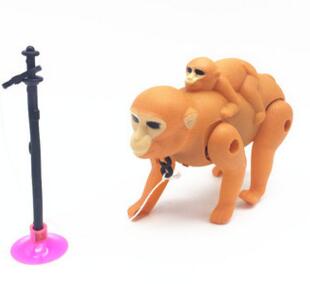 Electric monkey with a pile of 360-degree rotating... – Grandado