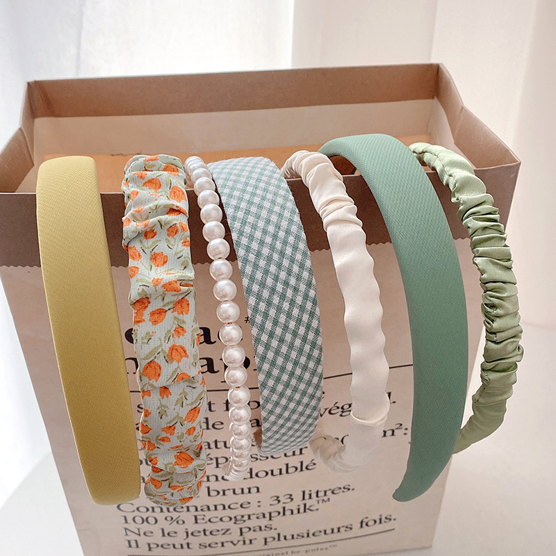 A group of five spring hairband female pearl face ... – Grandado