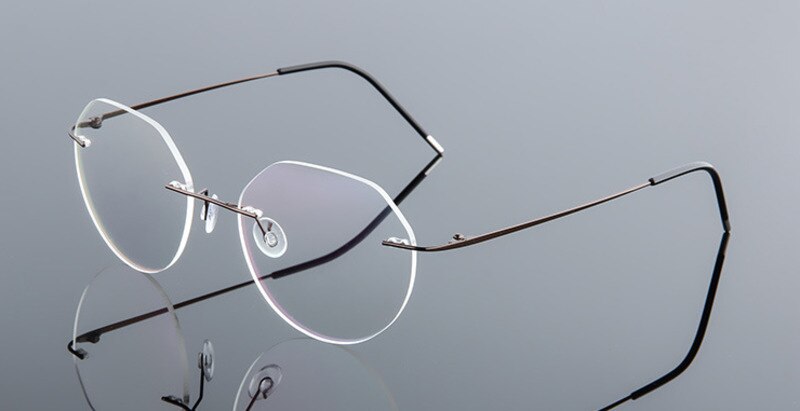 Retro Round Titanium Alloy Folding Frameless Men&... – Grandado