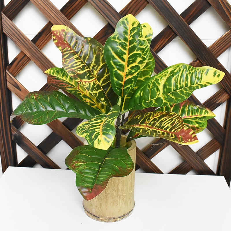 Artificial flowers sprinkle golden banyan leaves g... – Grandado